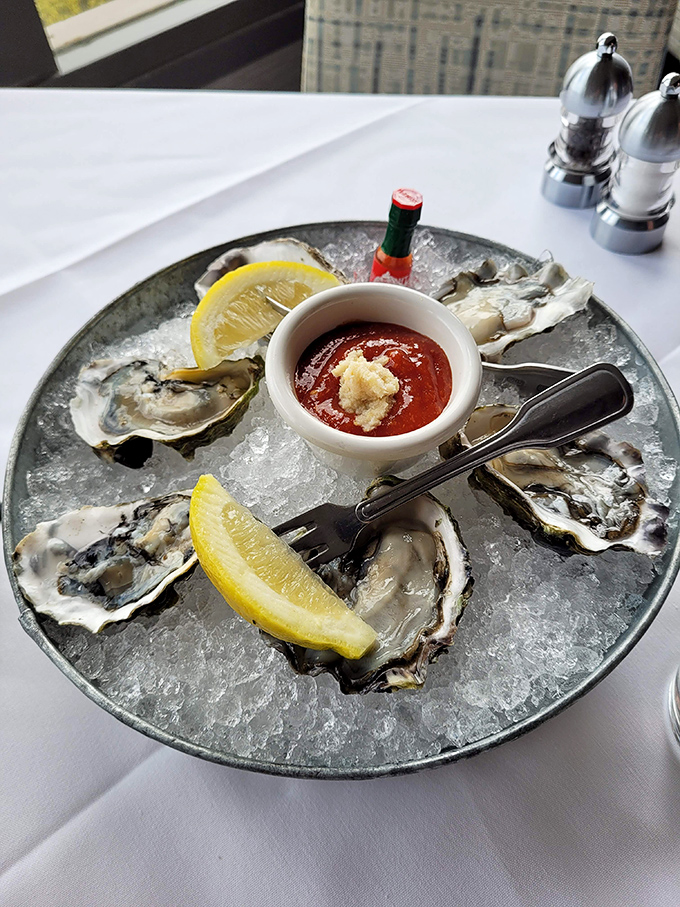 These oysters aren't just served&mdash;they're presented like jewelry on ice, with lemon wedges and cocktail sauce as the perfect accessories