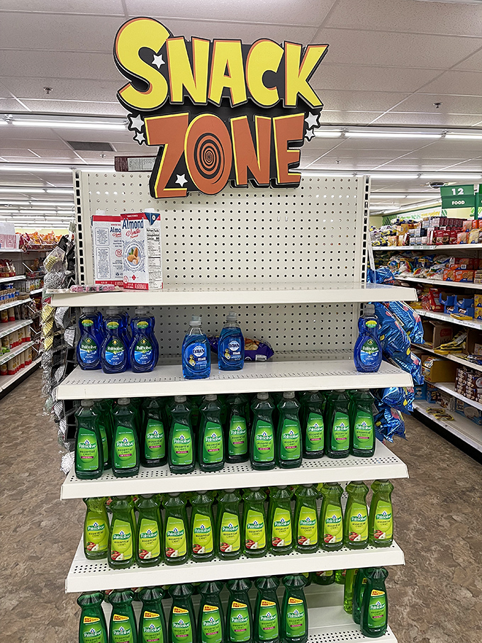 The "Snack Zone" sign hovers above cleaning supplies &ndash; a retail juxtaposition suggesting perhaps we should all eat more soap? Just kidding!