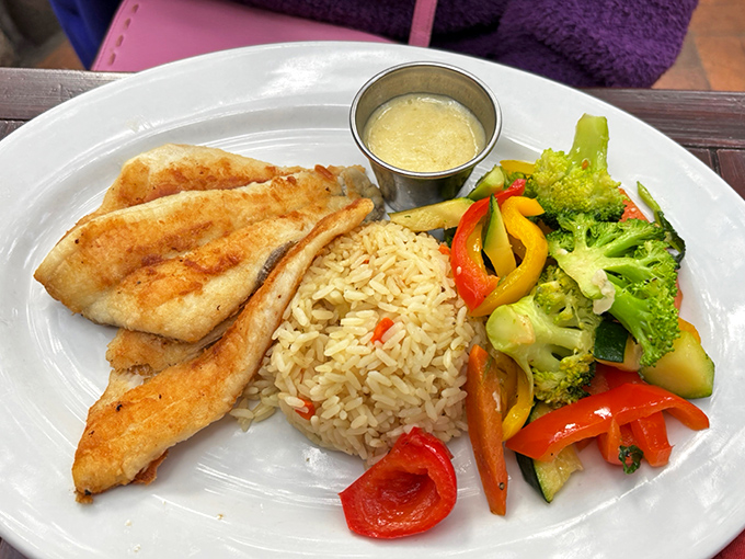 This delicate white fish arrives like a painting on a plate&mdash;crisp vegetables and fragrant rice playing supporting roles to the perfectly seared star.