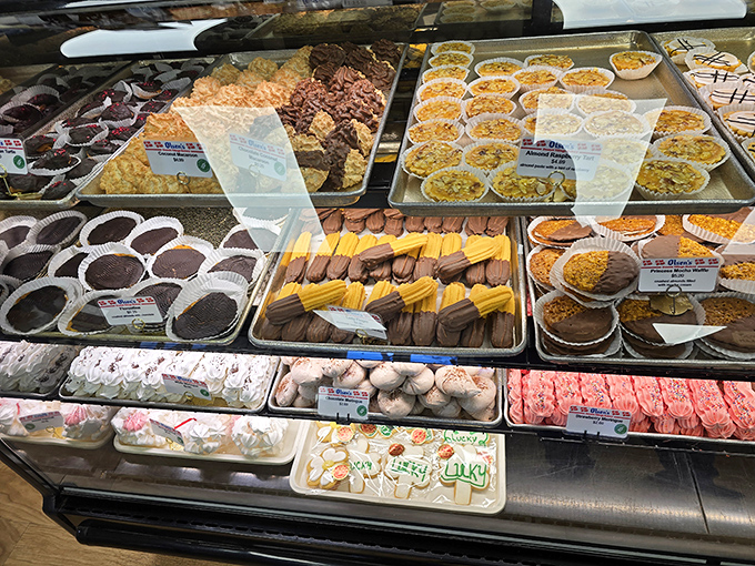 The display case: where dreams are made and diets go to die. Each tray contains a different path to bliss, all equally valid.