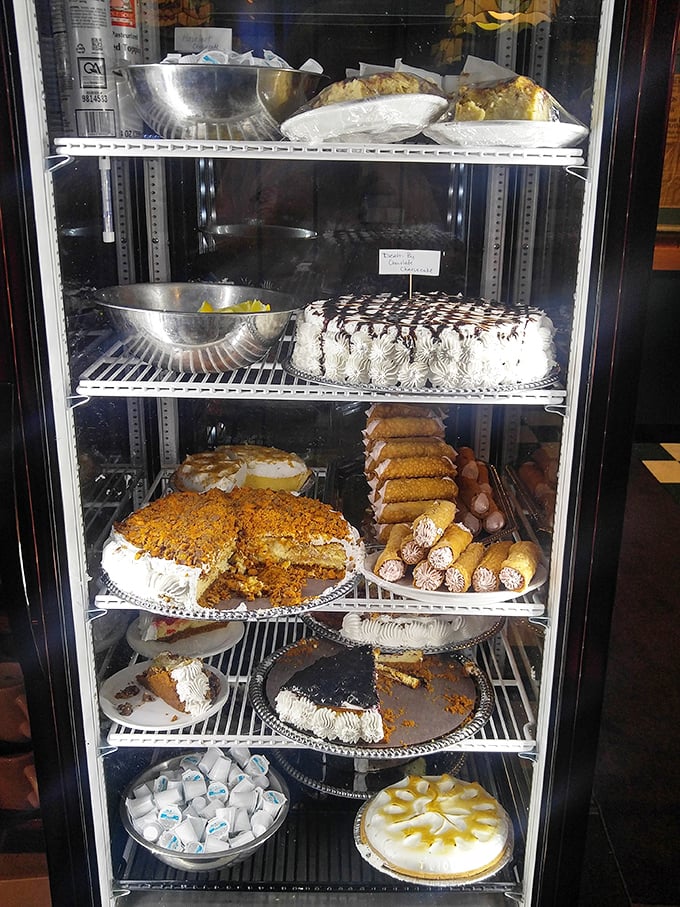 The dessert case&mdash;where willpower goes to die a glorious, sugar-coated death. That carrot cake is calling your name.