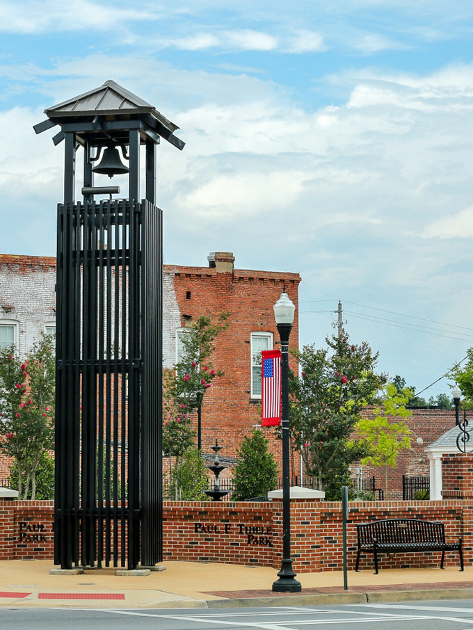 This bell tower stands as a gathering point in downtown Sandersville, offering a moment of reflection amid brick-lined paths and comfortable benches.
