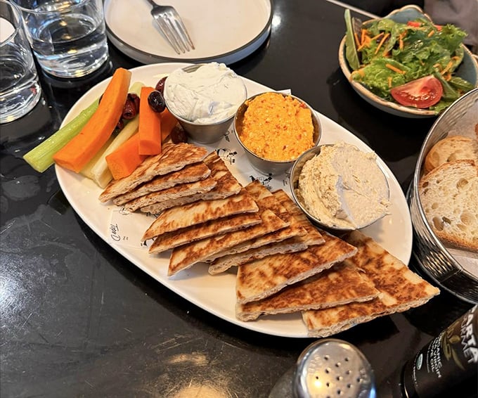 This Mediterranean platter proves Tops' range extends far beyond American classics, with dips and pita that would make Athens proud.