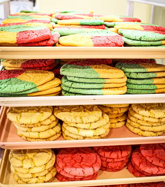 Colorful polvorones stacked like edible building blocks of joy&mdash;each one a multi-hued promise of melt-in-your-mouth delight.
