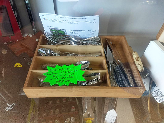 Silverware sets nestled in wooden dividers&mdash;the aristocrats of the utensil world, waiting to elevate someone's dining experience without the aristocratic price.