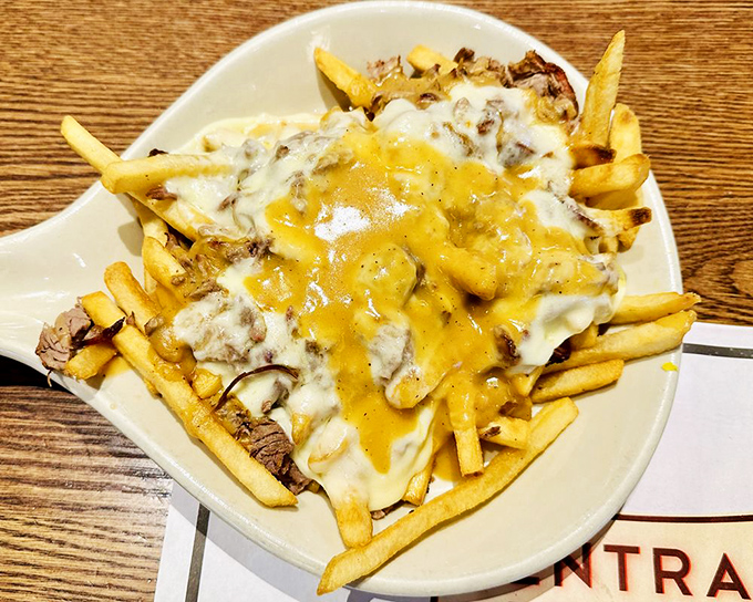 Fries, cheese, and gravy&mdash;the holy trinity of comfort food. This loaded masterpiece demands both a fork and a moment of respectful silence.