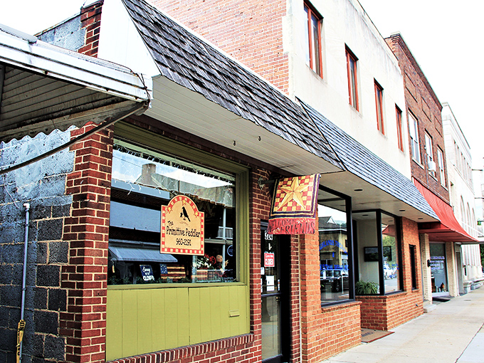 The Primitive Peddler's charming storefront hints at treasures inside that will make your spouse ask, "Where exactly are you planning to put that?"