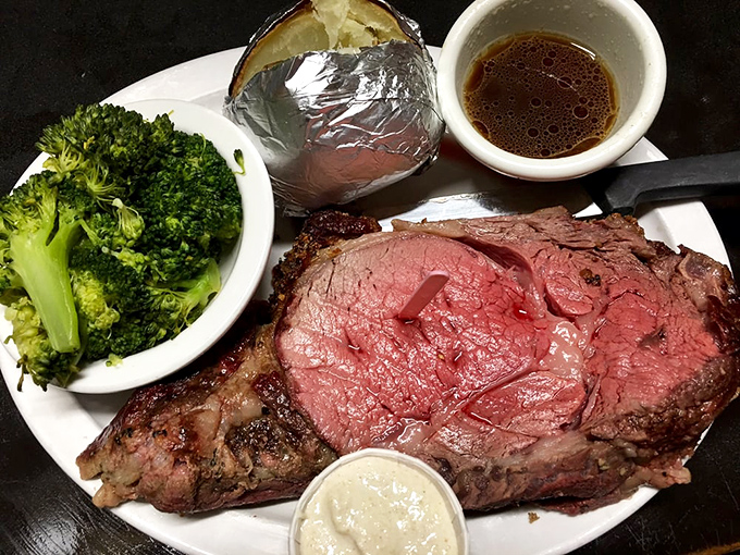 Prime rib cooked with the respect it deserves&mdash;pink in the middle, seasoned crust, with sides that know their supporting role in this meaty masterpiece.
