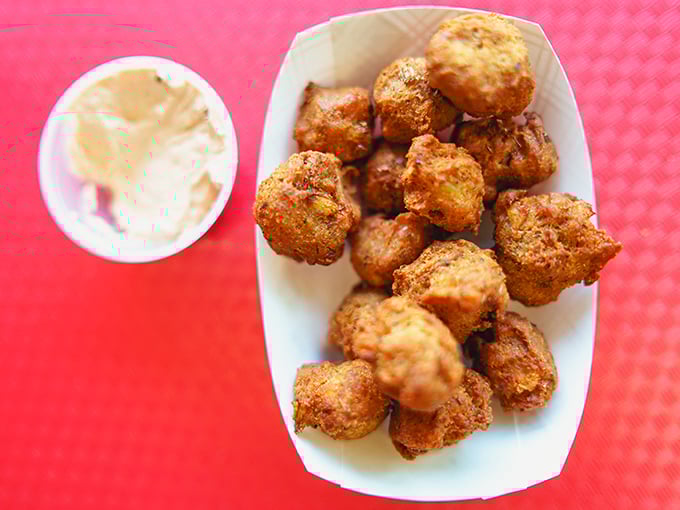 These golden-fried puffins aren't just appetizers &ndash; they're little spheres of joy that disappear faster than you can say "just one more."