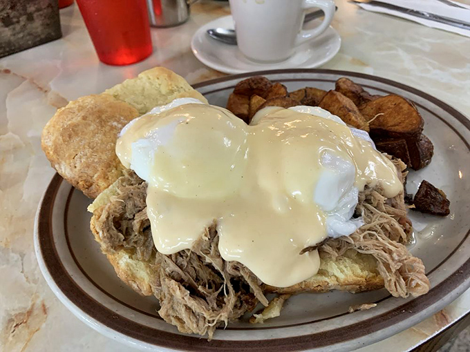 Eggs Benedict with pulled pork&mdash;breakfast's power couple. When hollandaise meets barbecue, everybody wins, especially your taste buds.