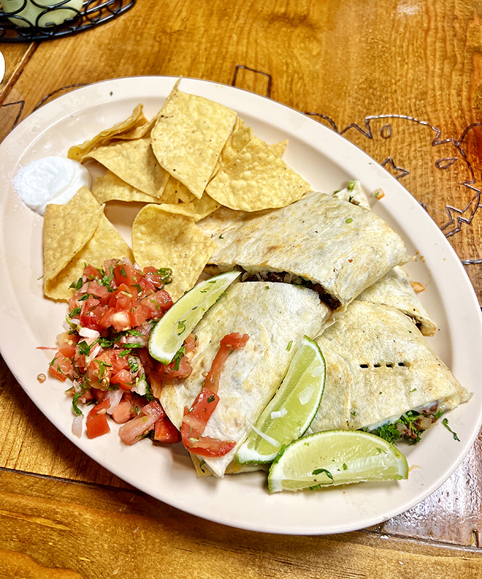 Not your microwave college dorm version. This quesadilla, with its perfect char marks and generous filling, graduated with honors.
