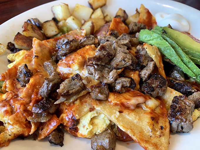 Breakfast with attitude! Eggs draped over tortillas with steak, avocado, and enough flavor to wake up your taste buds for a week.