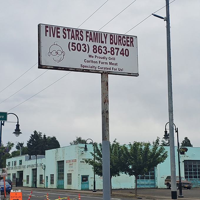 This roadside sign doesn't need fancy graphics or clever wordplay&mdash;just the promise of Carlton Farm meat "specially curated" for burger perfection.