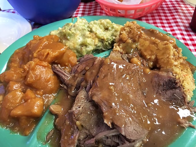 A meat-and-three masterpiece featuring fork-tender roast beef, sweet potatoes, and cornbread dressing&mdash;comfort food that speaks the universal language of "mmmmm."