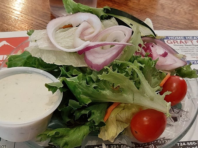 A simple side salad that knows its role&mdash;bringing crisp, fresh contrast to the parade of comfort classics heading your way.