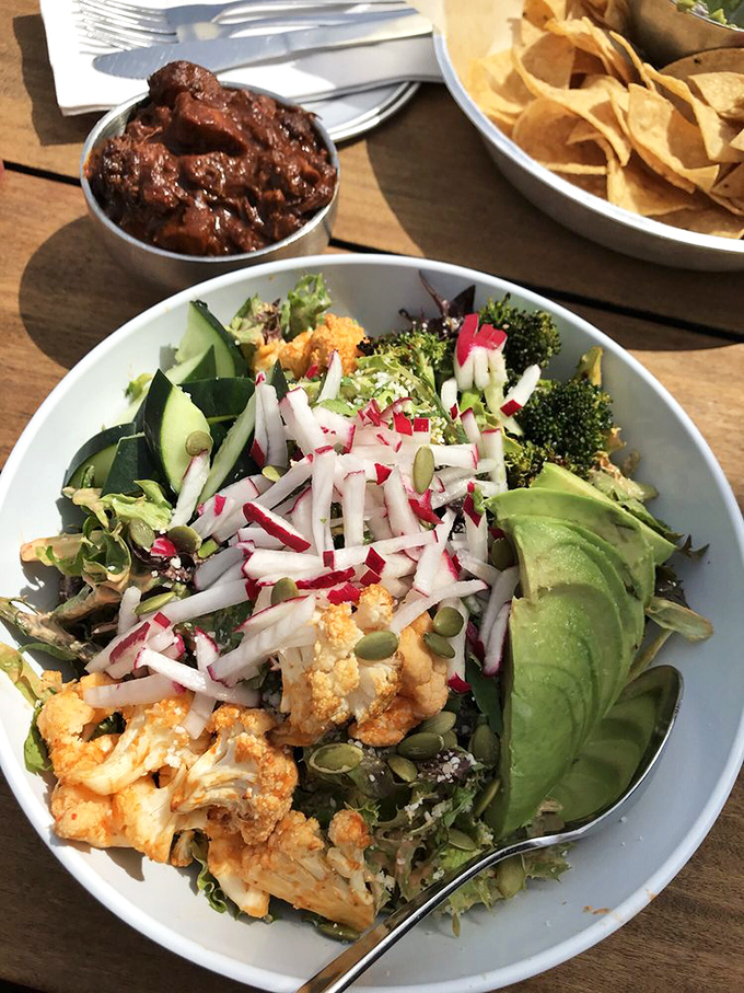 This isn't just a salad&mdash;it's a garden celebration. Roasted cauliflower, avocado, and radishes create a colorful fiesta that even carnivores will crave.