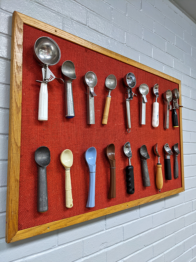 The scoop collection wall display is like the Smithsonian of ice cream history. Each scoop tells a story of desserts past, present, and deliciously future.