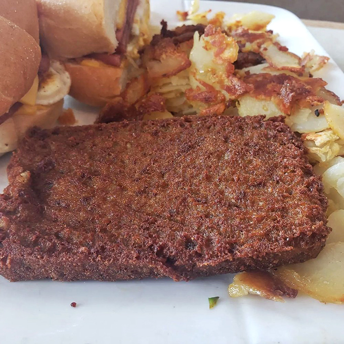 When breakfast meat deserves its own spotlight. Perfectly crisped, mysteriously delicious scrapple shares the plate with golden hash browns &ndash; a diner dream team.