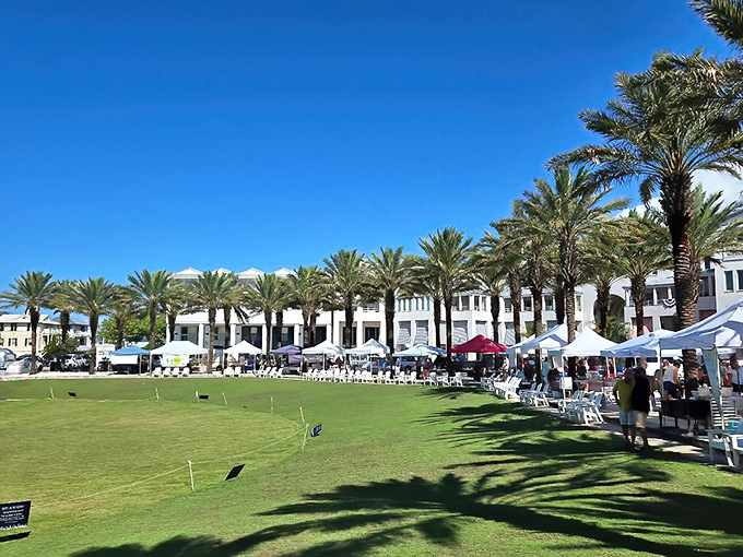 The farmers market transforms Seaside's central lawn into a celebration of local bounty, where shopping becomes a social event.