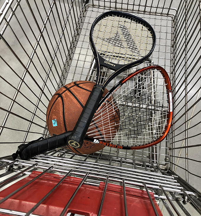 A shopping cart filled with weekend possibilities. Someone's abandoned tennis career becomes your new Sunday afternoon tradition.