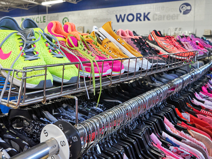 A rainbow of footwear possibilities! These vibrant sneakers await their second chance at adventure, proving one person's castoff is another's treasure.