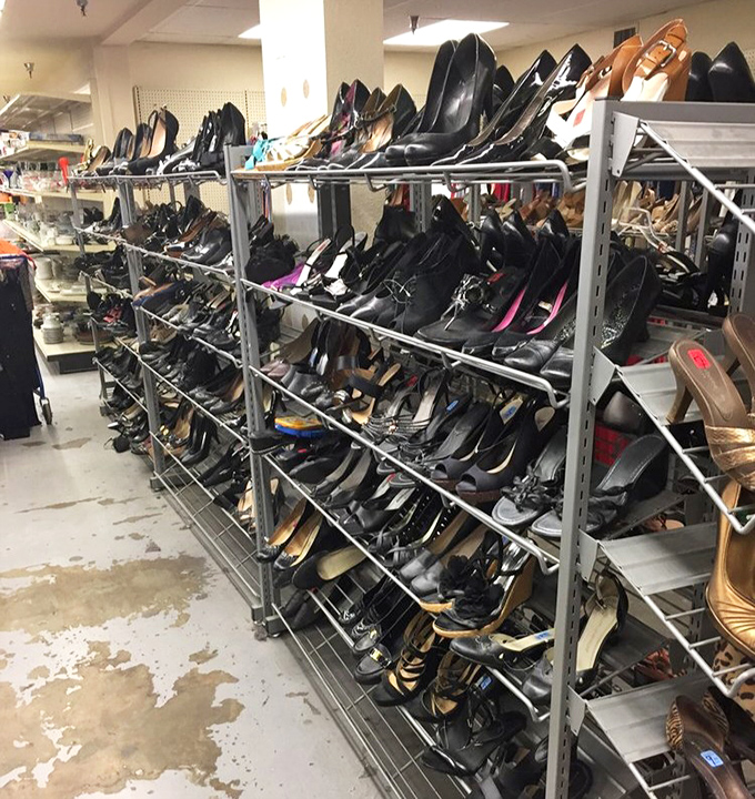 The shoe section: where stilettos, sneakers, and sensible flats coexist in harmony, waiting for Cinderella moments at fraction-of-retail prices.