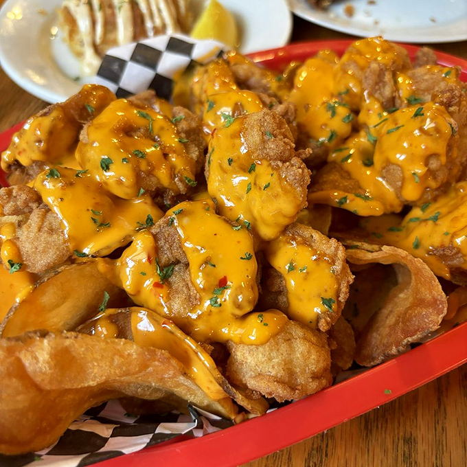 These golden-fried shrimp, draped in cheese sauce, aren't just an appetizer&mdash;they're the opening act of a culinary concert you won't forget.