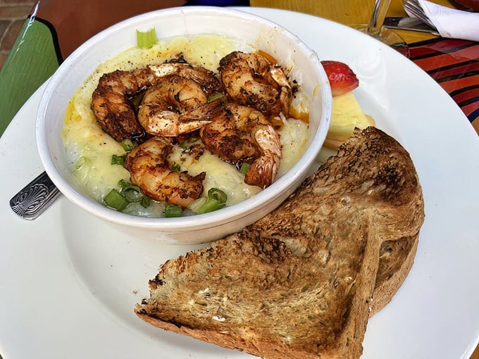 Shrimp and grits that would make a Southerner tip their hat&mdash;spicy crustaceans lounging on a bed of creamy comfort.