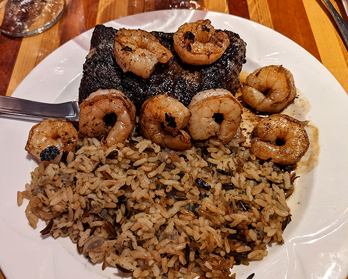 Surf and turf, Selah-style – perfectly seared steak and plump shrimp atop rice that's absorbed all the right flavors from its prestigious neighbors.