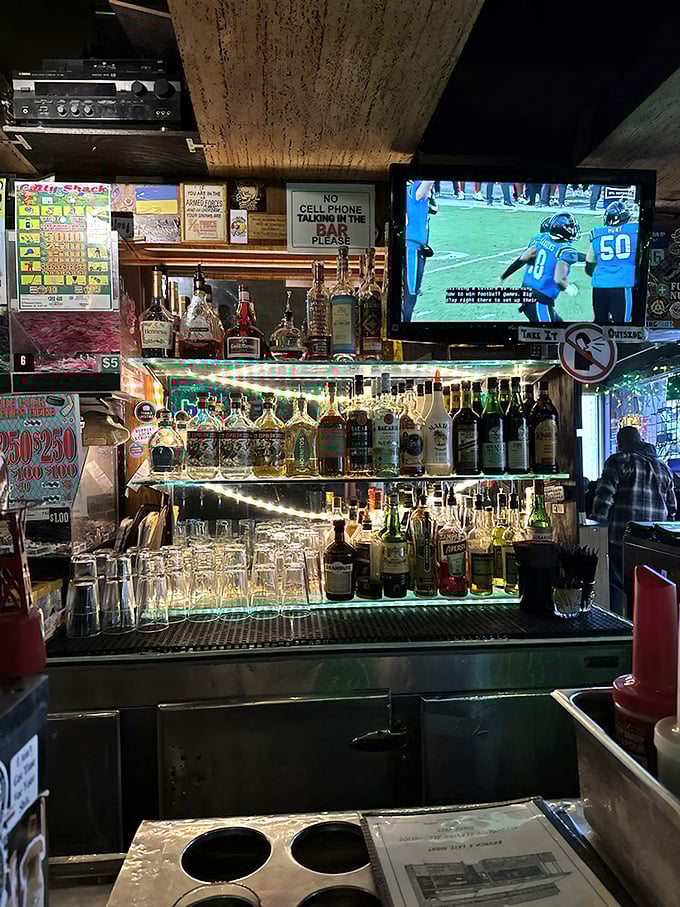 Behind every great dive bar is a well-stocked shelf of spirits&mdash;this one's illuminated like a shrine to good times and questionable decisions.
