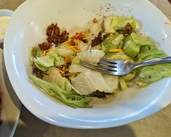 Even the side salad gets respect here&mdash;crisp lettuce, shredded cheese, and that sense that vegetables can be more than an obligation.