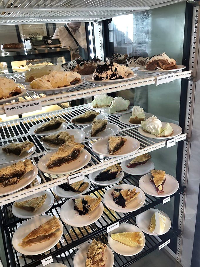 The pie display case should come with a warning label: "May cause spontaneous happiness and the inability to choose just one slice."