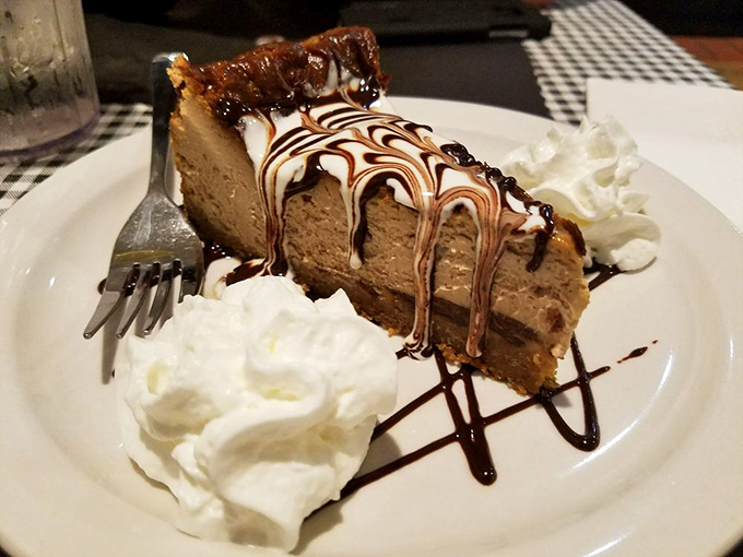 S'mores cheesecake that combines childhood campfire memories with grown-up indulgence, proving that adulthood has its privileges after all.