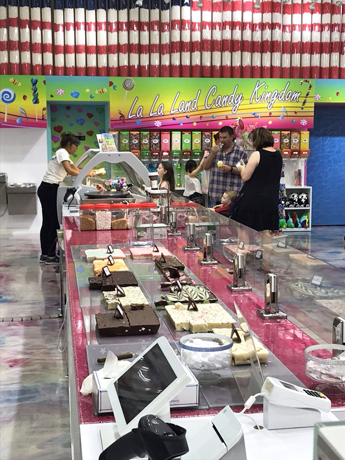 The fudge-cutting ceremony: where skilled candy artisans transform blocks of creamy delight into take-home treasures before your eyes.