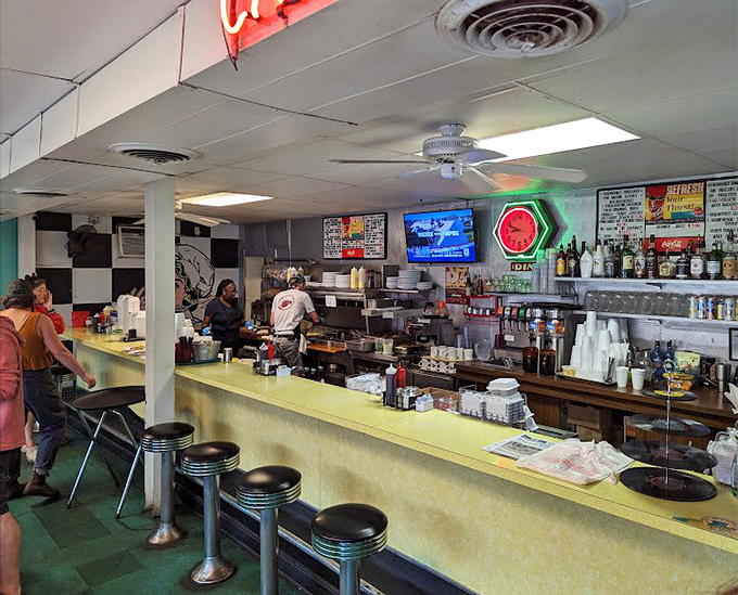 Where the magic happens. The counter service view shows the choreographed dance of breakfast preparation that results in those dream-worthy plates.