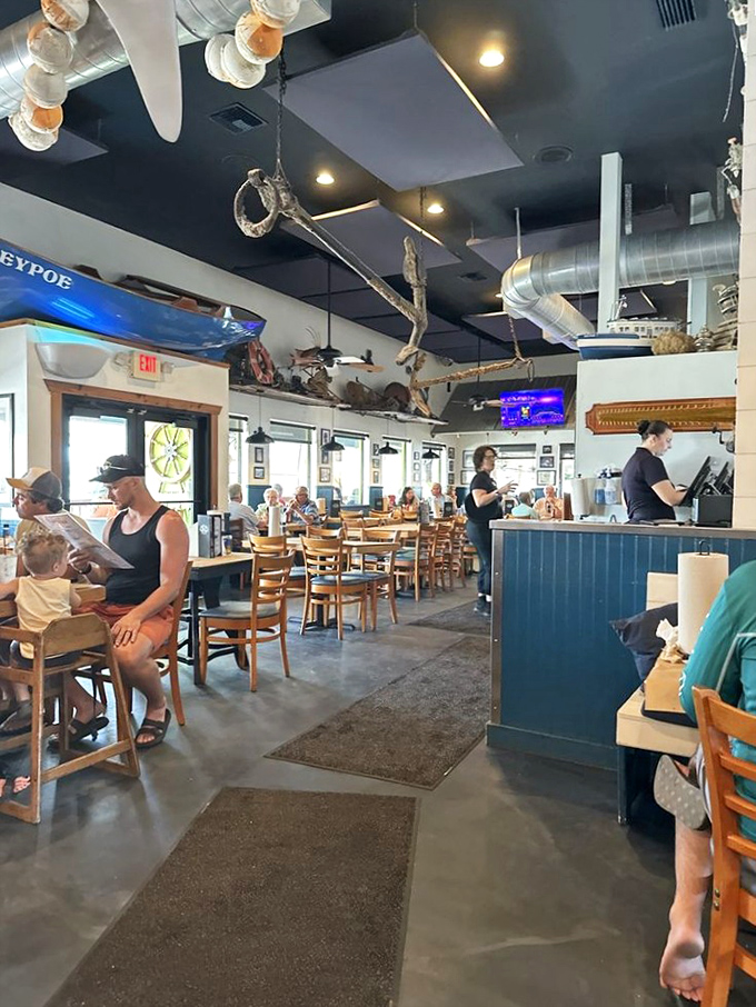 A dining room where maritime meets mealtime. Those hanging decorations aren't just for show &ndash; they're conversation starters.