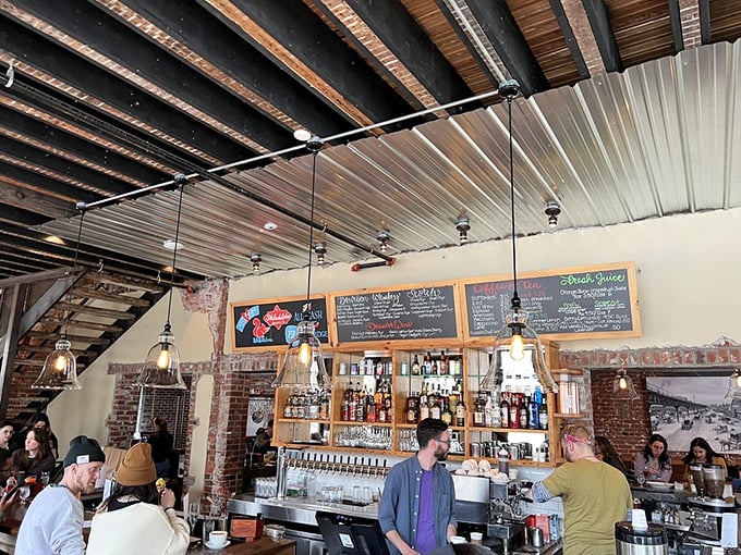 A place where every detail matters, from the food to the atmosphere. The industrial ceiling, pendant lighting, and bustling bar create the perfect backdrop for culinary exploration.