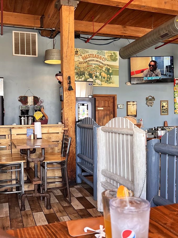 Blue walls and wooden beams frame a space where smoke and time work their magic. This isn't just decoration&mdash;it's a barbecue sanctuary.