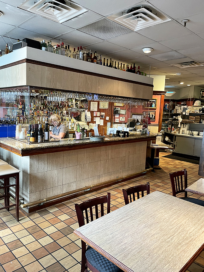 Behind every great diner is a bar that knows exactly what you need before you do. The bottles standing at attention like old friends waiting to say hello.