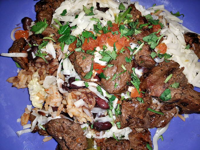 This isn't just a rice bowl&mdash;it's a carefully orchestrated symphony of protein, beans, and fresh herbs that hits all the right notes.