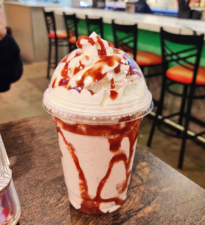 Strawberry shake art that belongs in both galleries and stomachs. The swirls of sauce create a dessert that's almost too pretty to drink&mdash;almost.