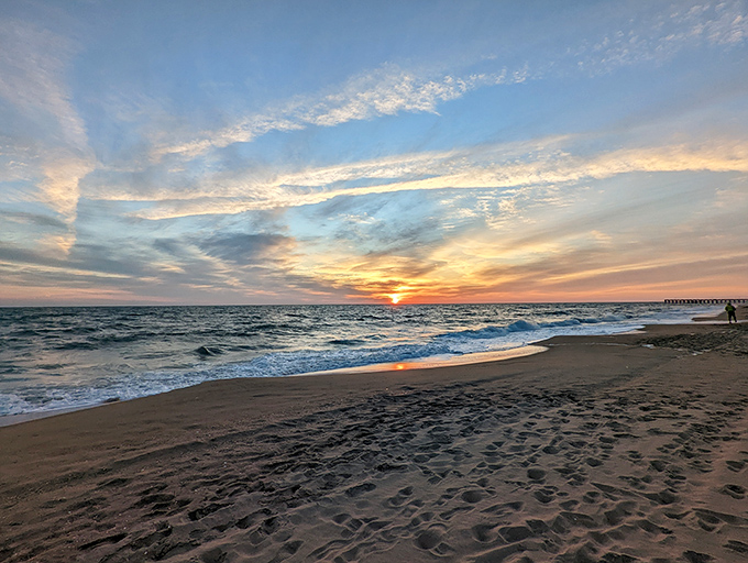 Mother Nature showing off at sunset, painting the sky in colors that would make even Bob Ross whisper, "Happy little clouds indeed."