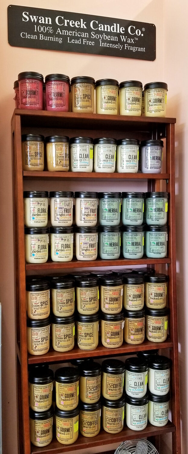 The Swan Creek Candle display offers a fragrant journey through scents that evoke everything from grandma's kitchen to woodland adventures.