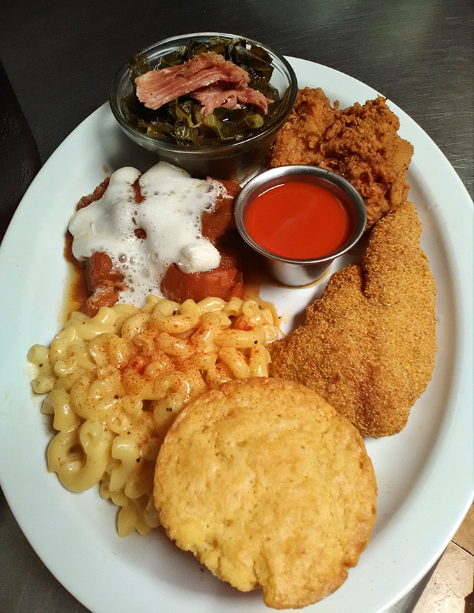 A plate that doesn't know the meaning of restraint. Mac and cheese, greens, cornbread, and chicken &ndash; the Mount Rushmore of comfort.