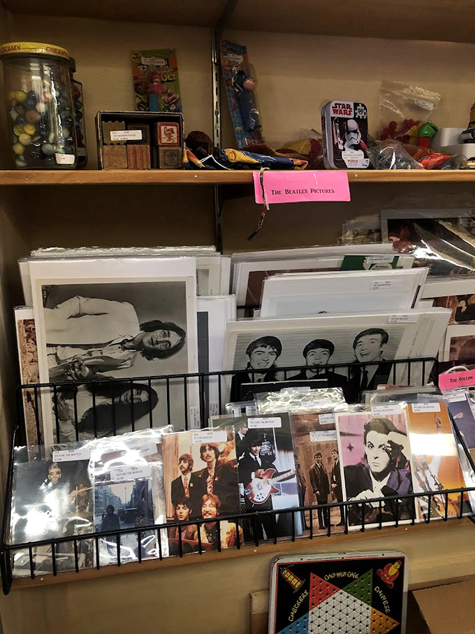 The Beatles memorabilia corner is where music history meets collectible investment. These images of the Fab Four still draw fans across generational lines.