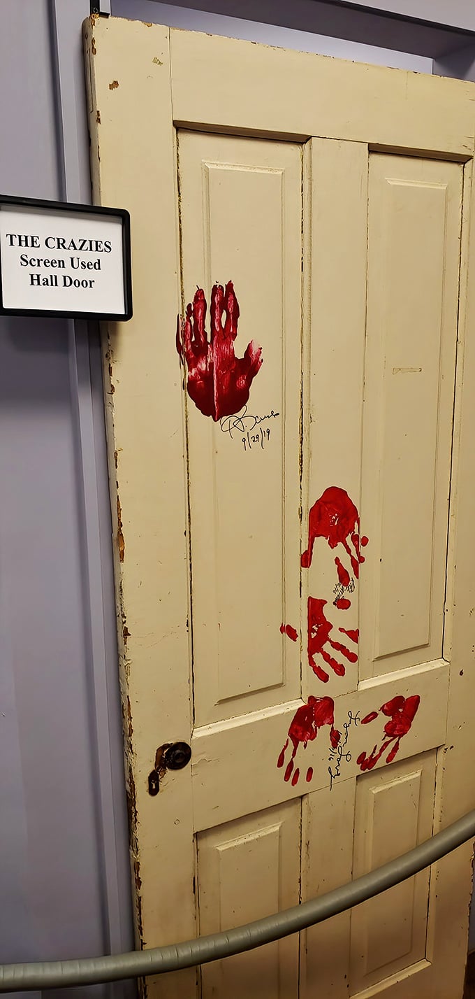 Blood-smeared handprints tell a desperate story on this screen-used door&mdash;some movie props are worth preserving for posterity.