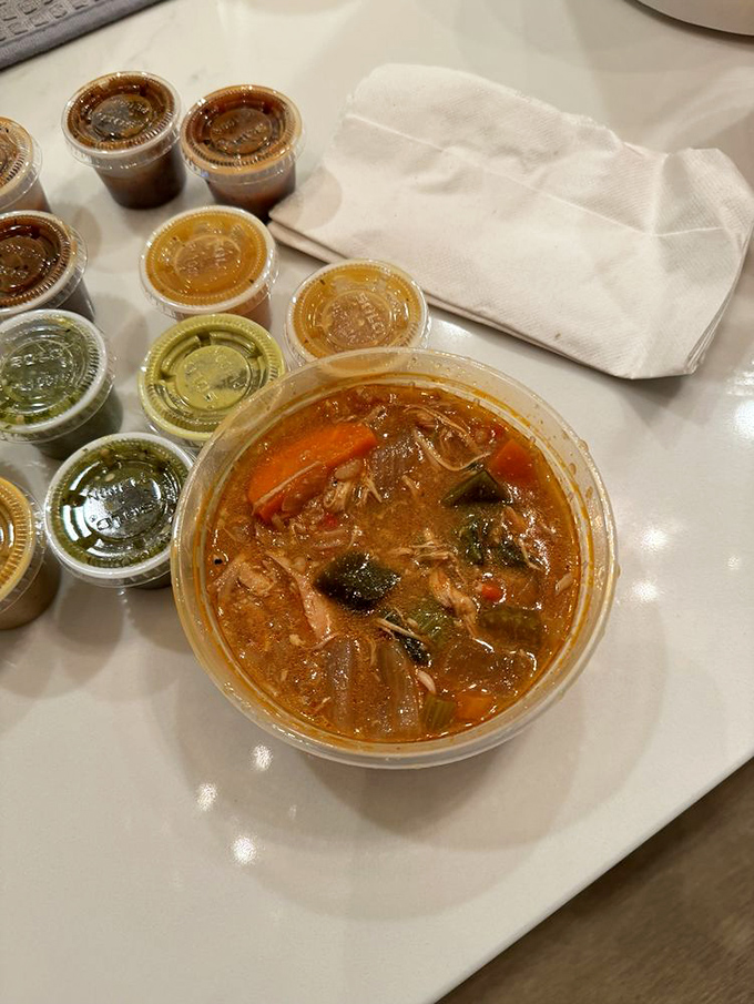 This isn't just soup&mdash;it's a spicy, soul-warming bowl of complexity surrounded by its salsa sidekicks, ready for dunking duty.