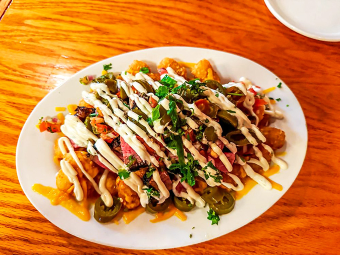 These loaded tots aren't just an appetizer &ndash; they're the opening act that sets the tone for the culinary concert to come.