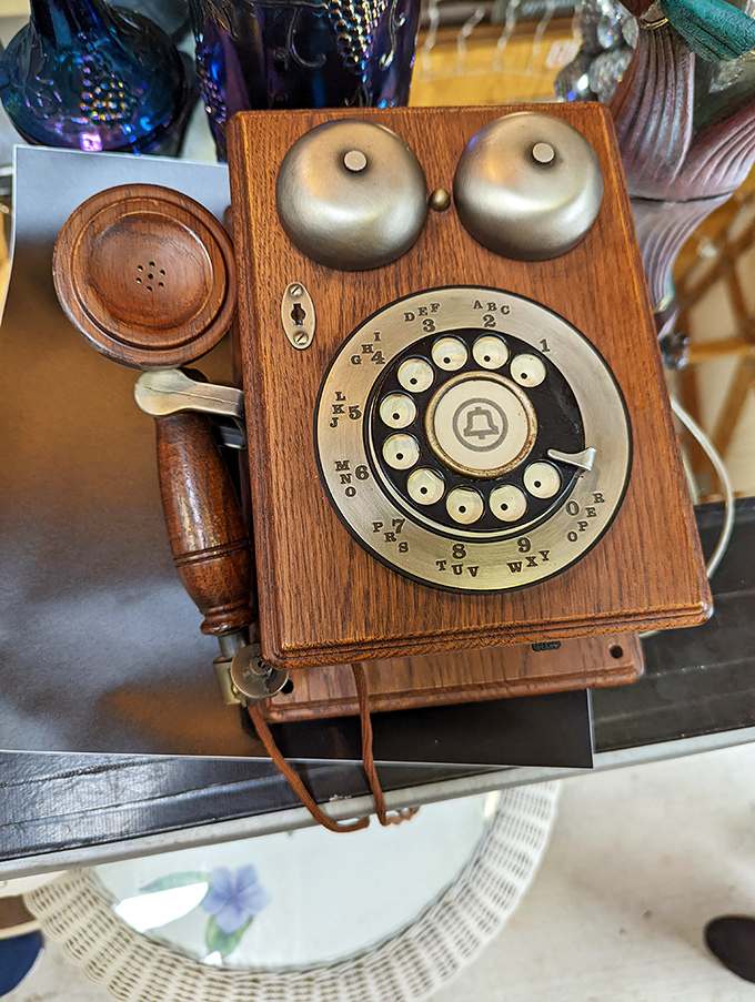 This vintage telephone doesn't just connect calls&mdash;it connects generations, standing as a wooden and brass monument to communication's simpler days.