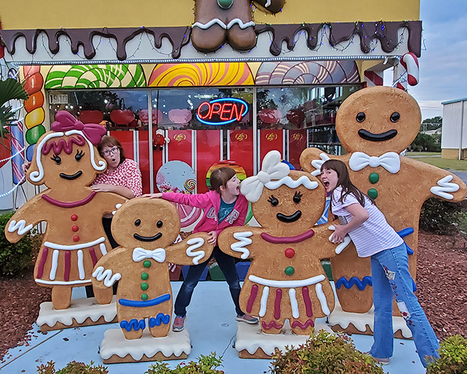 The image shows visitors enjoying the outdoor display. A perfect photo opportunity where memories are made as sweet as the treats inside.